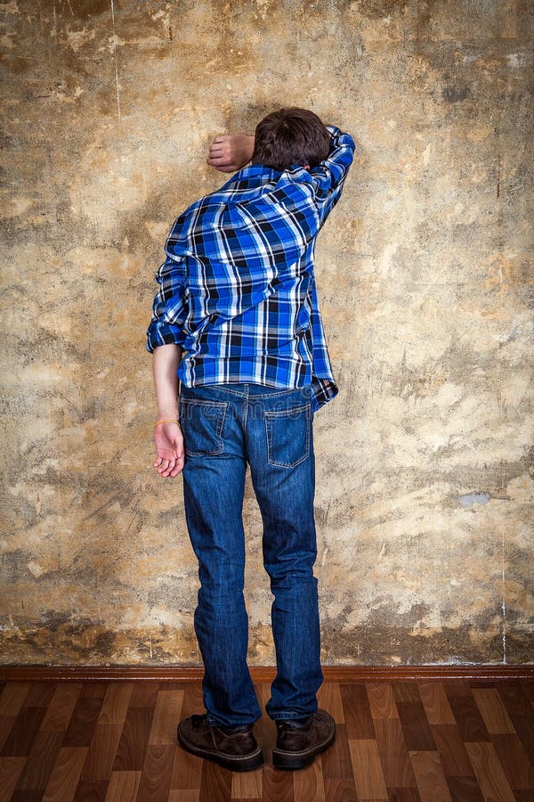 Sad Young Man stock image. Image of grief, interior - 105261571