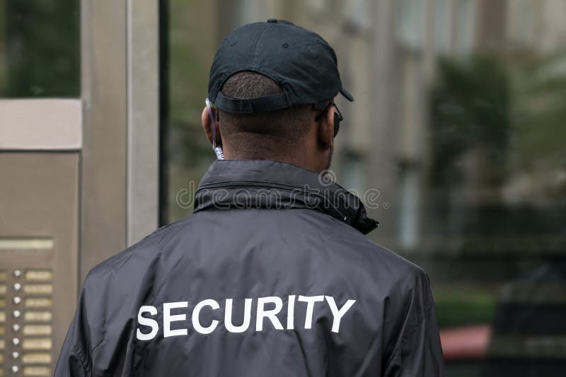 Rear View of a Security Guard Stock Photo - Image of safe, guard: 213850760