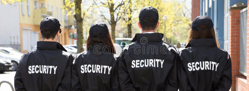 Security Guards Standing in a Row Stock Photo - Image of back, black ...