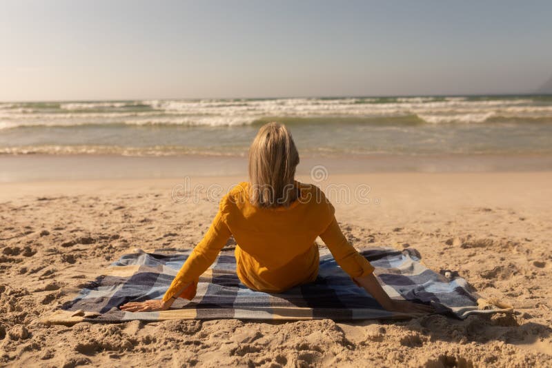 Senior Woman Looking at View on the Beach Stock Photo - Image of beach ...