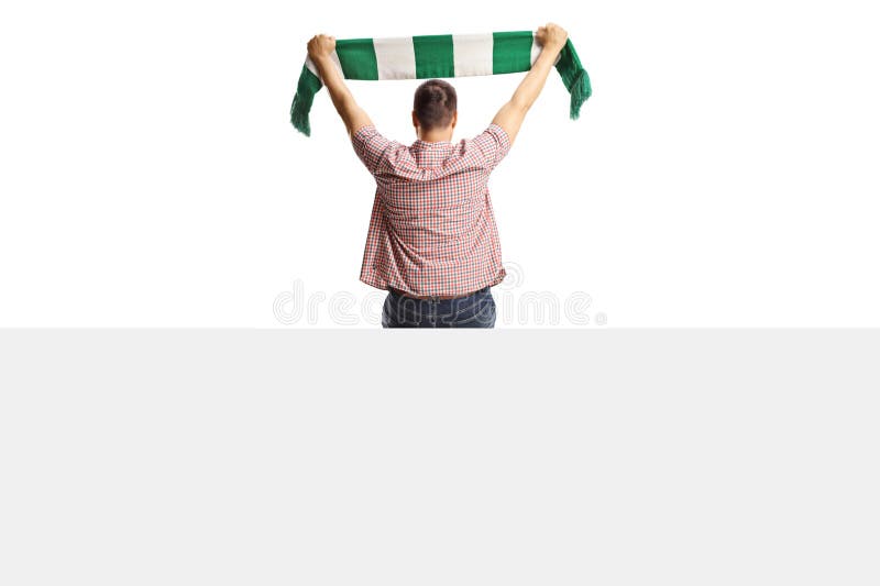 Rear View Shot of a Man Holding a Scarf Sitting on a Panel and Cheering ...