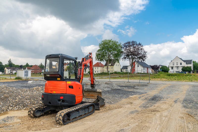Rear View of a Small Red Excavator Standing on the Edge of a ...