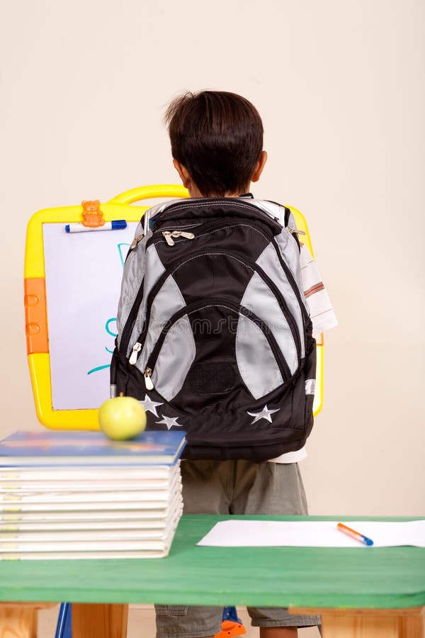 Rear View of a Smart School Kid Stock Image - Image of casual, school ...