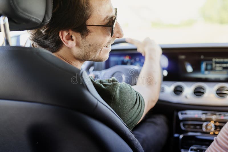 Rear View of Man Driving in the Car Stock Image - Image of interior ...