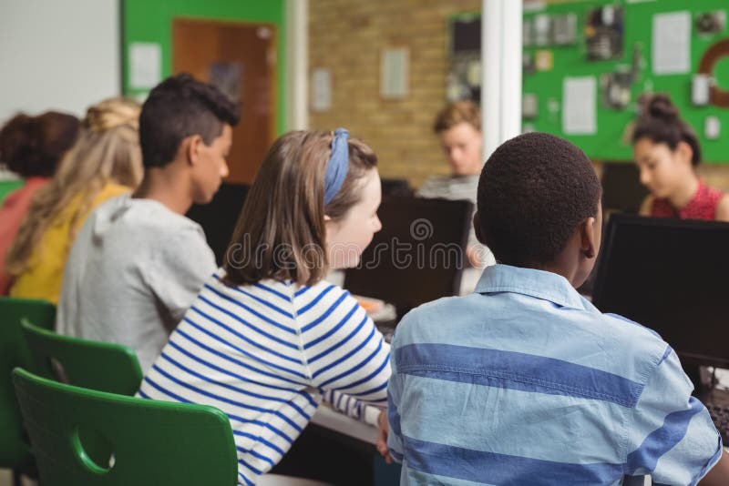 Rear View of Students Studying in Computer Classroom Stock Photo ...