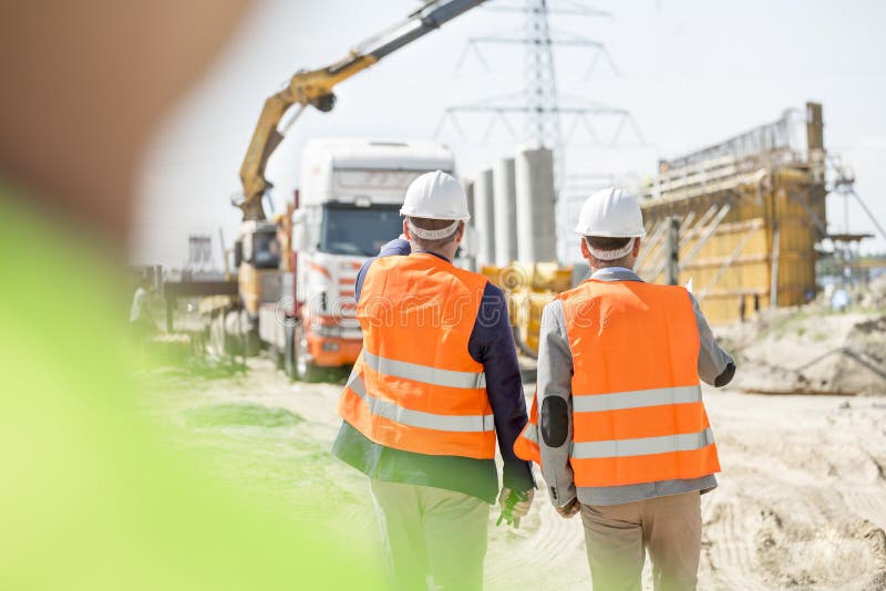 Rear View of Supervisors Walking at Construction Site Stock Photo ...