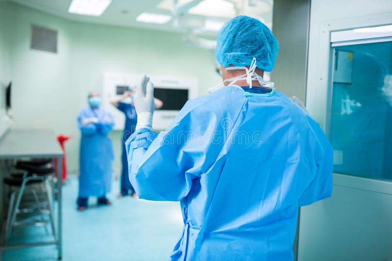 Rear View of Surgeon Walking in Operation Room Stock Image - Image of ...