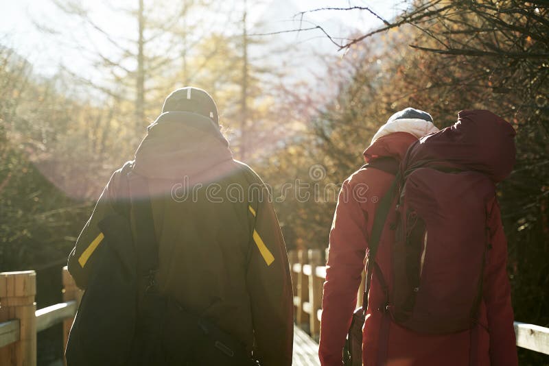 Two Asian Hikers Set Out for the Mountains Stock Image - Image of ...
