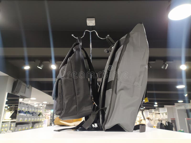 Rear View Two Black and White Backpack in Shopping Mall. Stock Photo ...