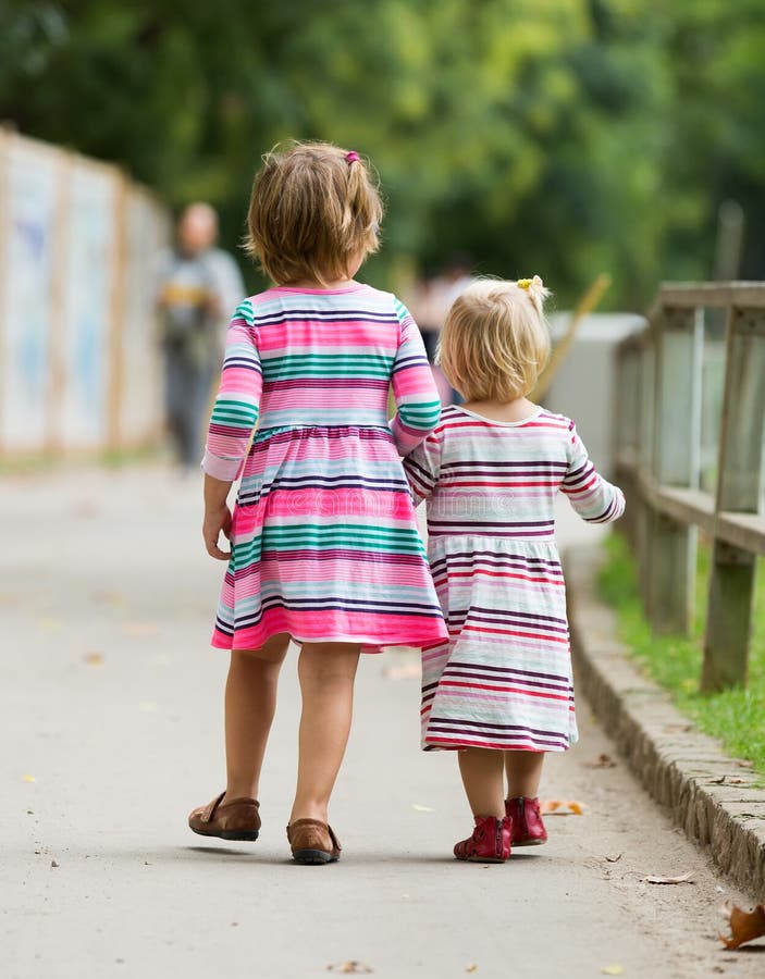 View On Children Swinging Together On Children's Playground Stock Image ...