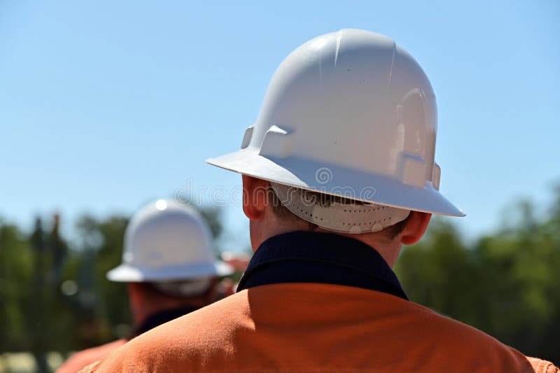 Rear View of Two Unrecognizable Blue Collar Workers Stock Photo - Image ...