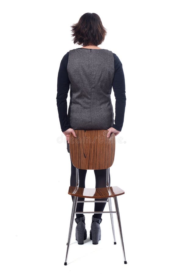 Rear View of a Woman with a Chair in White Background Stock Photo ...