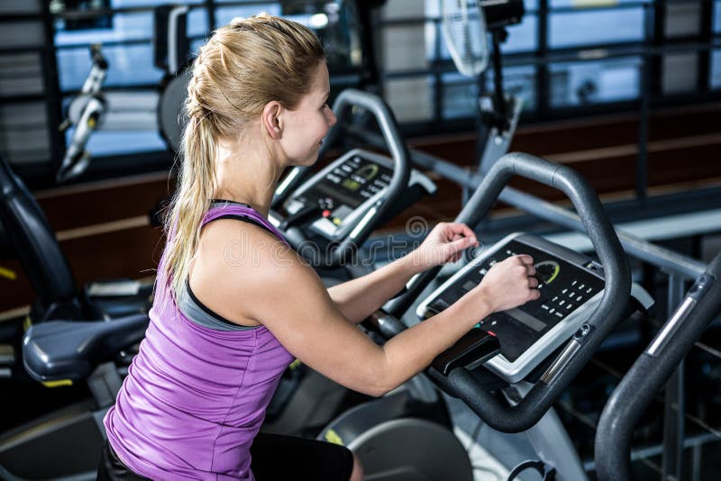 Rear View of Woman Doing Bike Exercise Stock Photo - Image of smile ...