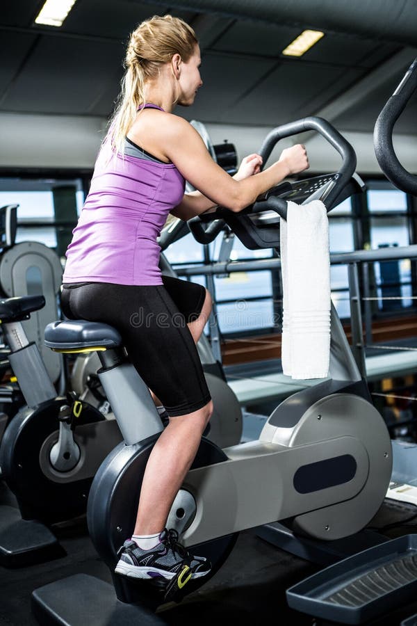 Rear View of Woman Doing Bike Exercise Stock Photo - Image of care ...