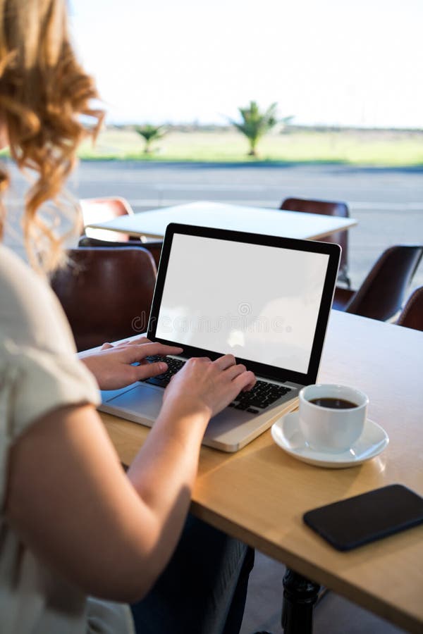 Rear View of Woman Using Her Laptop Stock Photo - Image of drink ...