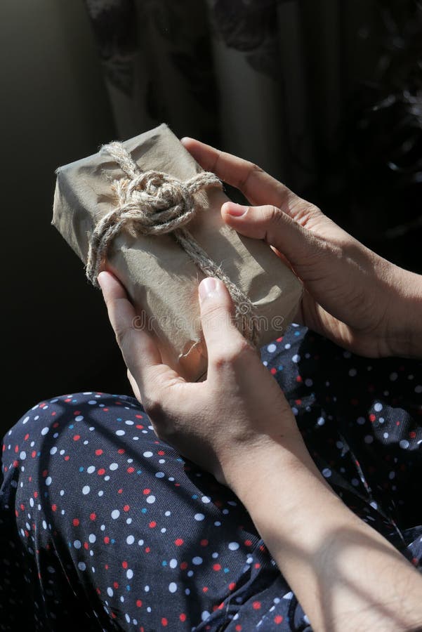 Rear View of Women Hand Holding a Gift Box Stock Photo - Image of ...