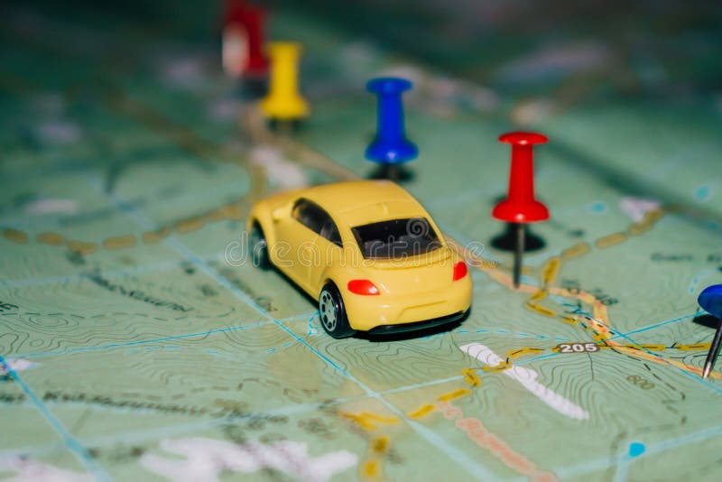 Rear View of the Yellow Car, Which is Located on a Topographic Map with ...