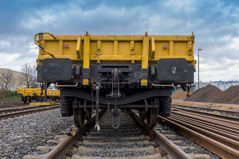 Rear View of a Yellow Open Freight Wagon Stock Photo - Image of station ...