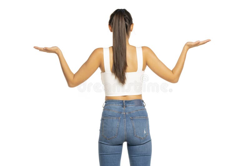 Rear View of a Young Beautiful Woman Holding Imaginary Objects in Her ...
