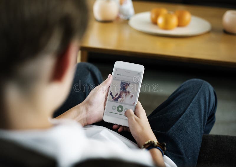 Rear View of Young Caucasian Boy Using Mobile Phone Stock Photo - Image ...