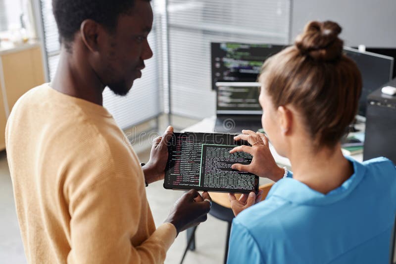Colleagues Discussing Codes of Software Stock Photo - Image of internet ... Colleagues Discussing Codes of Software Stock Photo - Image of internet ...