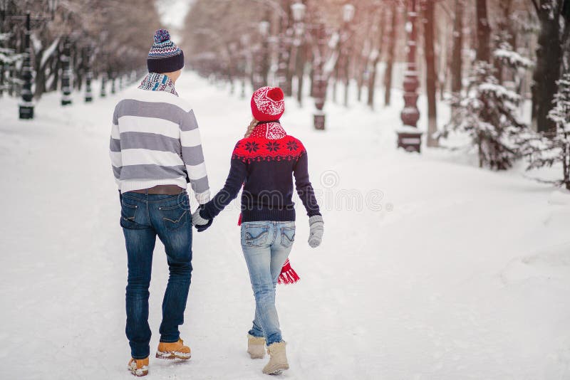Rear View of Young Couple Walking in Winter Park Stock Photo - Image of ...