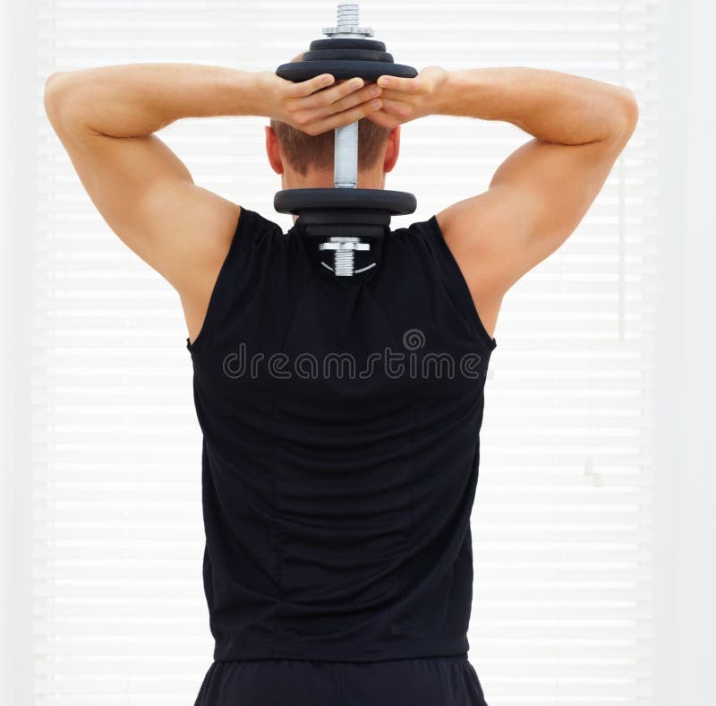 Rear View of a Young Guy Exercising His Triceps Stock Photo - Image of ...