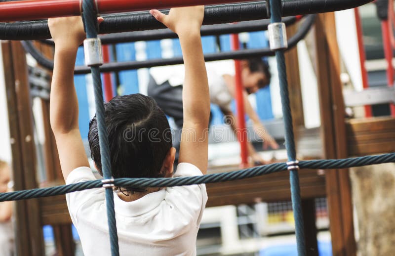 Rear View of Young Kindergarten Boy at Playground Stock Photo - Image ...