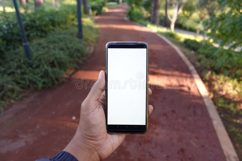 Rear View of Young Man Using Smart Phone at Outdoor Stock Image - Image ...
