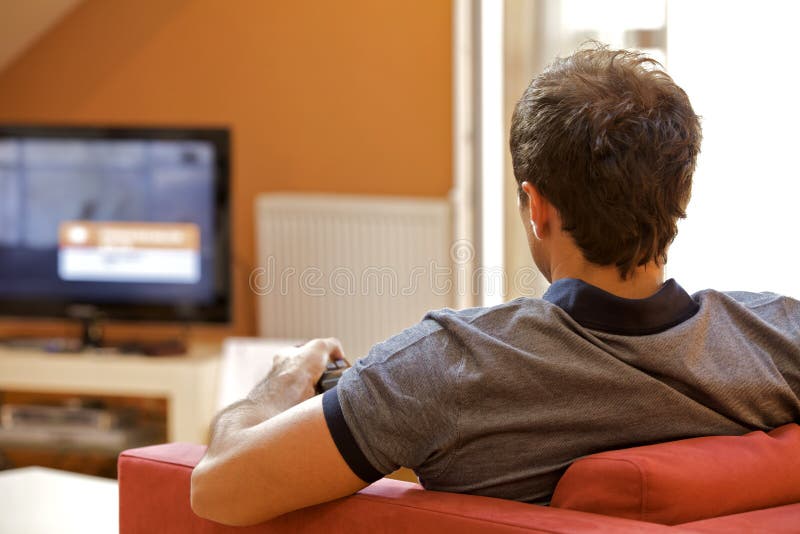 Rear View of Young Man Watching Television Stock Image - Image of room ...