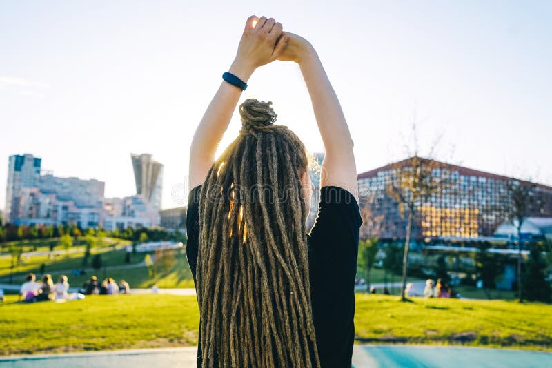 Rear View Young Woman with Dreadlocks in Park. Stock Photo - Image of ...