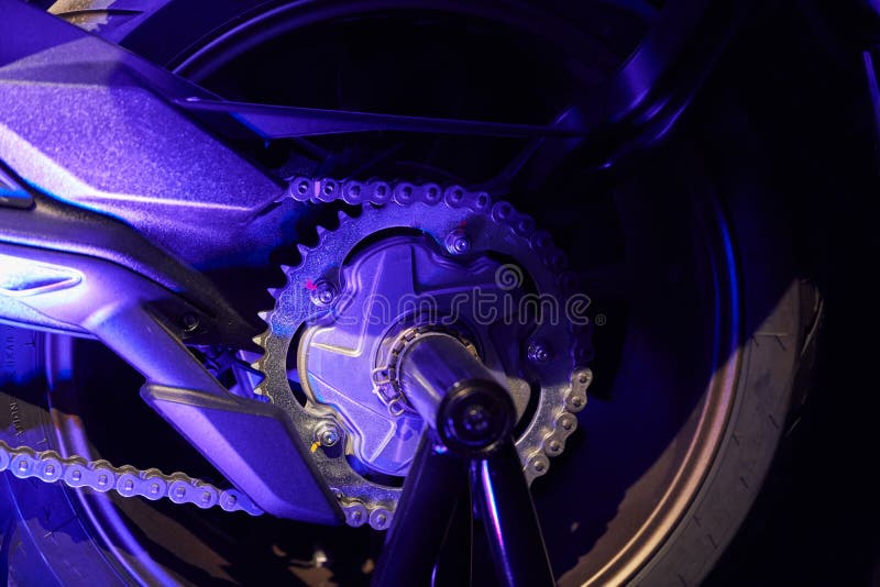 The Rear Wheel of a Modern Motorcycle with Blue Lighting. Studio ...