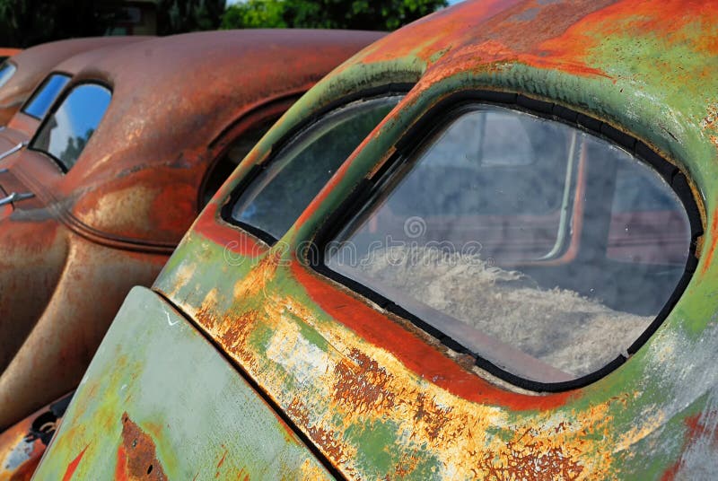 Rear Windows of a Collection of Old Rusty Cars Stock Photo - Image of ...
