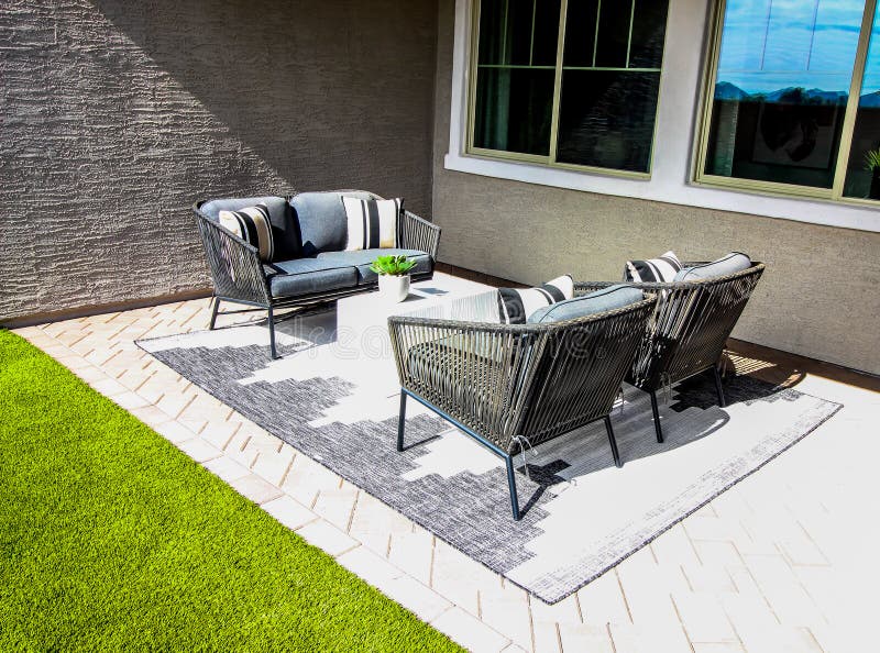 Rear Yard Patio with Chairs, Couth and Table Stock Photo - Image of ...