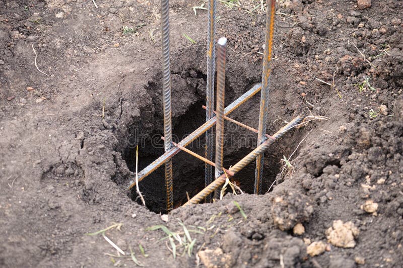 Rebar Installed in Hole in the Ground for the Foundation of a Building ...