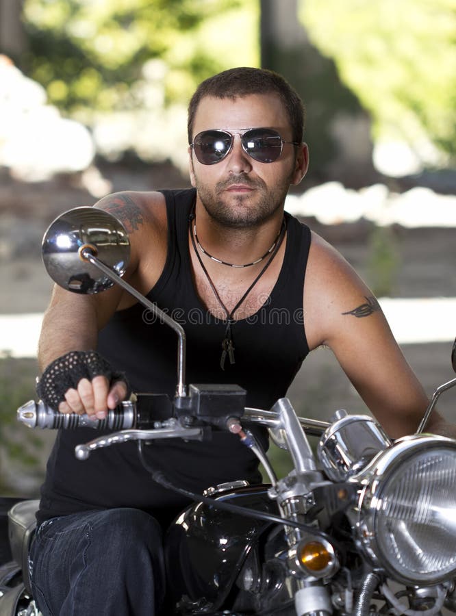 Rebel motorcycle rider stock photo. Image of male, shirt - 26553760