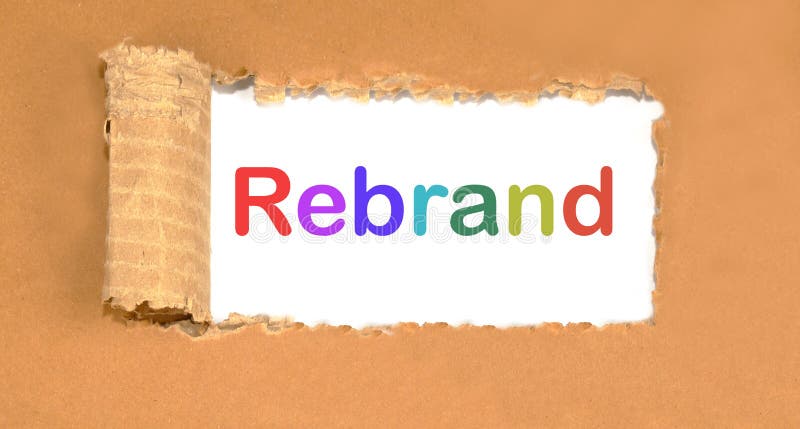 Rebrand Lettering on Torn Cardboard. Marketing Concept Stock Photo ...