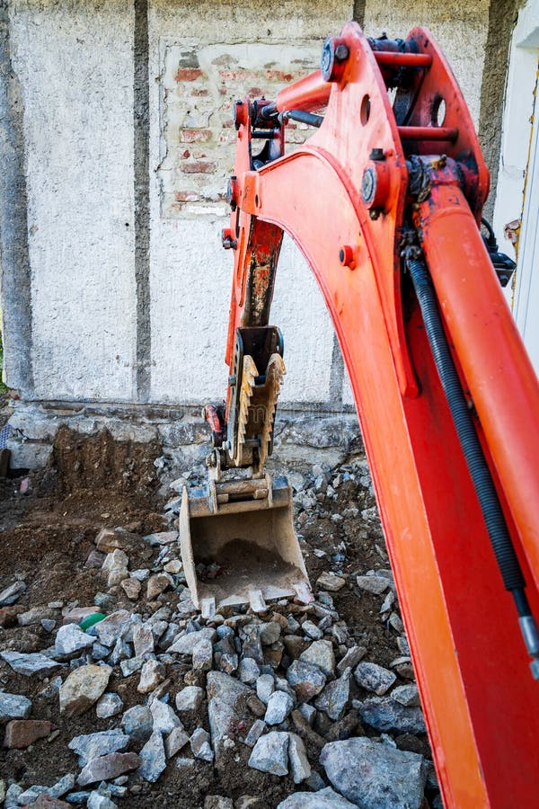 Rebuilding a House and Digging Dirt with Excavator Stock Image - Image ...