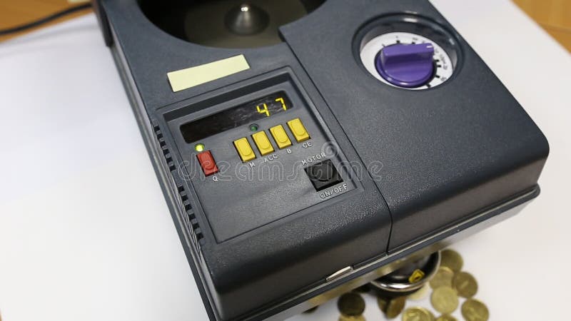 Recalculation of Gold Coins in a Counting Machine Stock Footage - Video ...