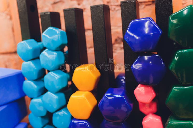 Receding Row of Weights Lined Up in a Gym Waiting for Clients with ...
