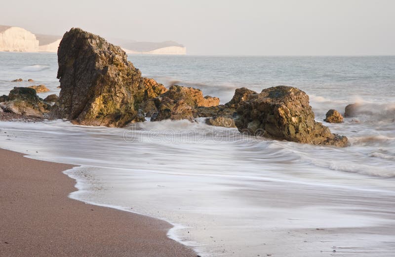 Receding Waves Over Rocky Coastline Stock Image - Image of coast, beach ...