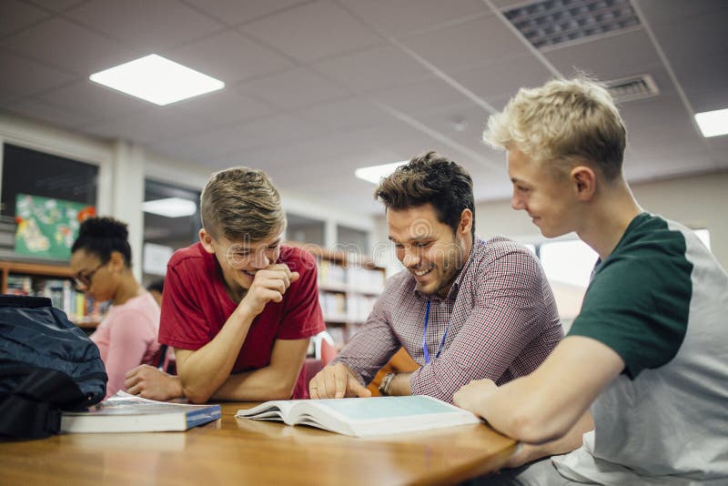 Asian Student Studying with Colleagues in Classroom Stock Image - Image ...