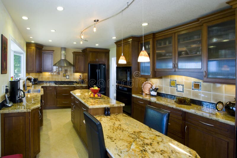 Kitchen Interior with Stone Accents in Affluent Ho Stock Photo - Image ...