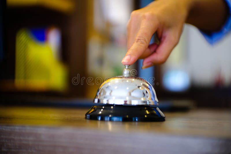 Reception Bell on the Desk in Hotel Stock Image - Image of finger ...