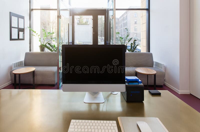 Reception Desk with Computer and Black Blank Screen Stock Image - Image ...