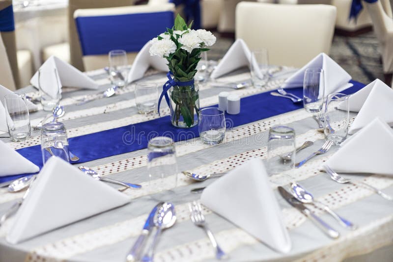 Reception Dinner Table Setup with Dinnerware, Napkin, Spoon, Fork and ...
