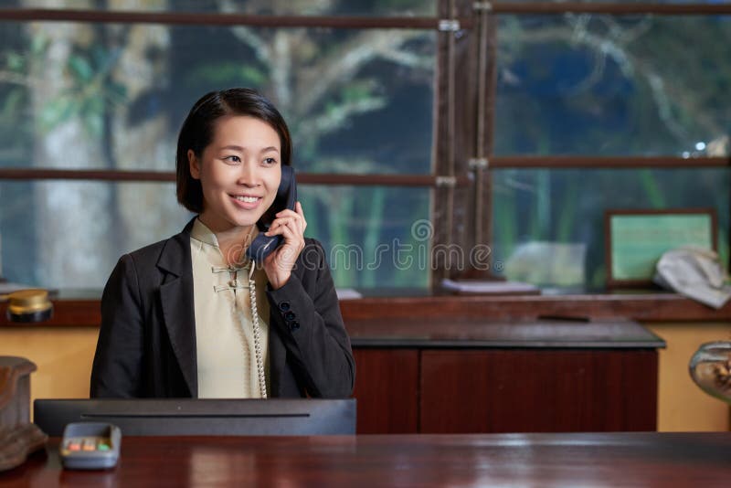 Pretty receptionist stock image. Image of woman, portrait - 114776093