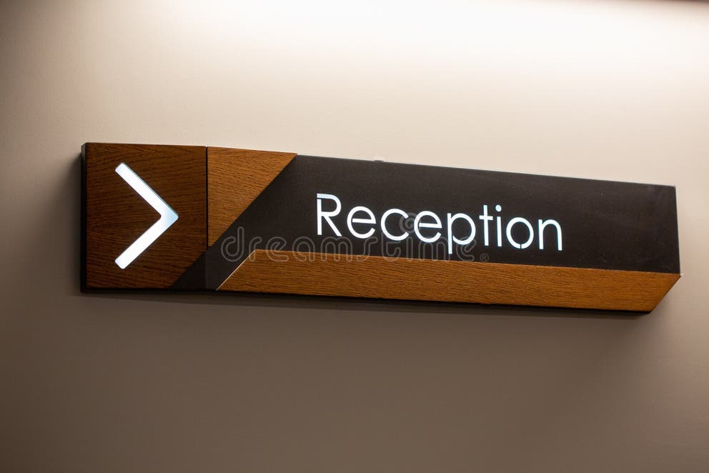 Reception Sign with Direction Arrow on the Wall Stock Image - Image of ...