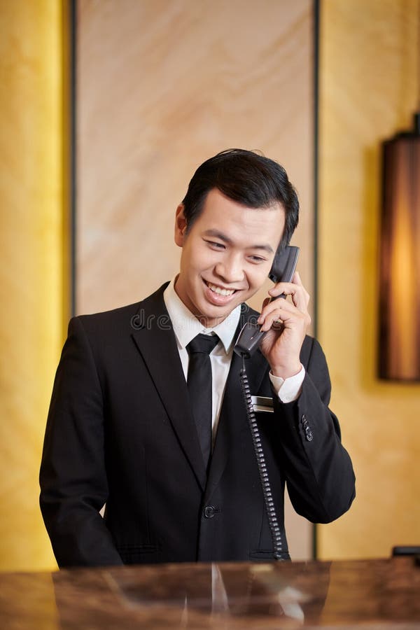 Receptionist Answering Phone Call Stock Image - Image of talk, talking ...