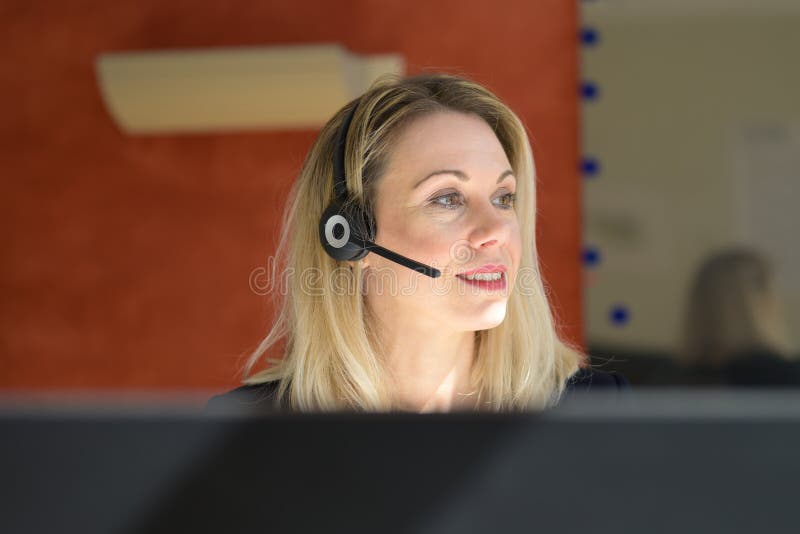 Receptionist or Call Centre Operator Taking a Telephone Call Stock ...
